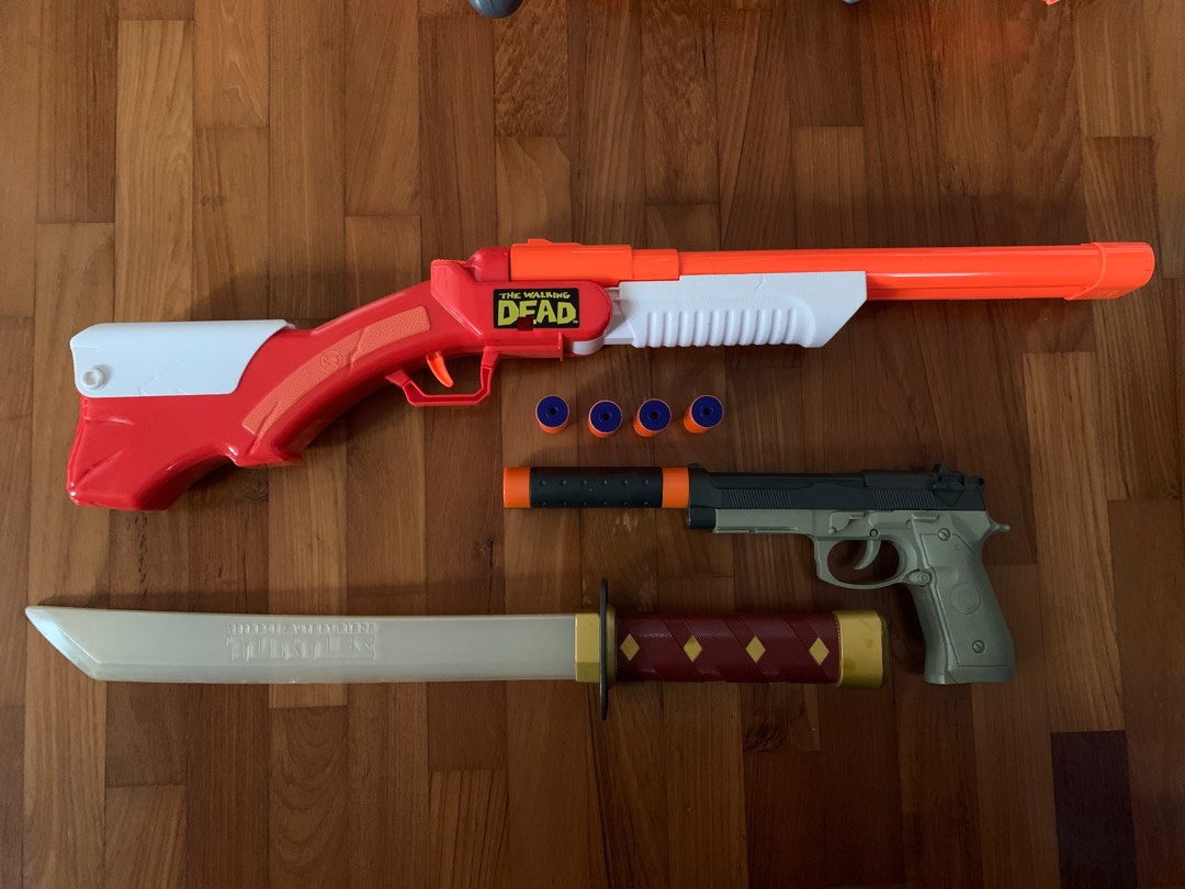 The walking dead Rifle, Ninja Turtle Sword and misc toy gun, Hobbies ...