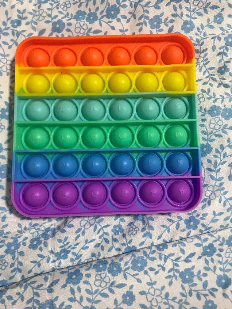 ABC pop it with rainbow colours, Hobbies & Toys, Toys & Games on Carousell