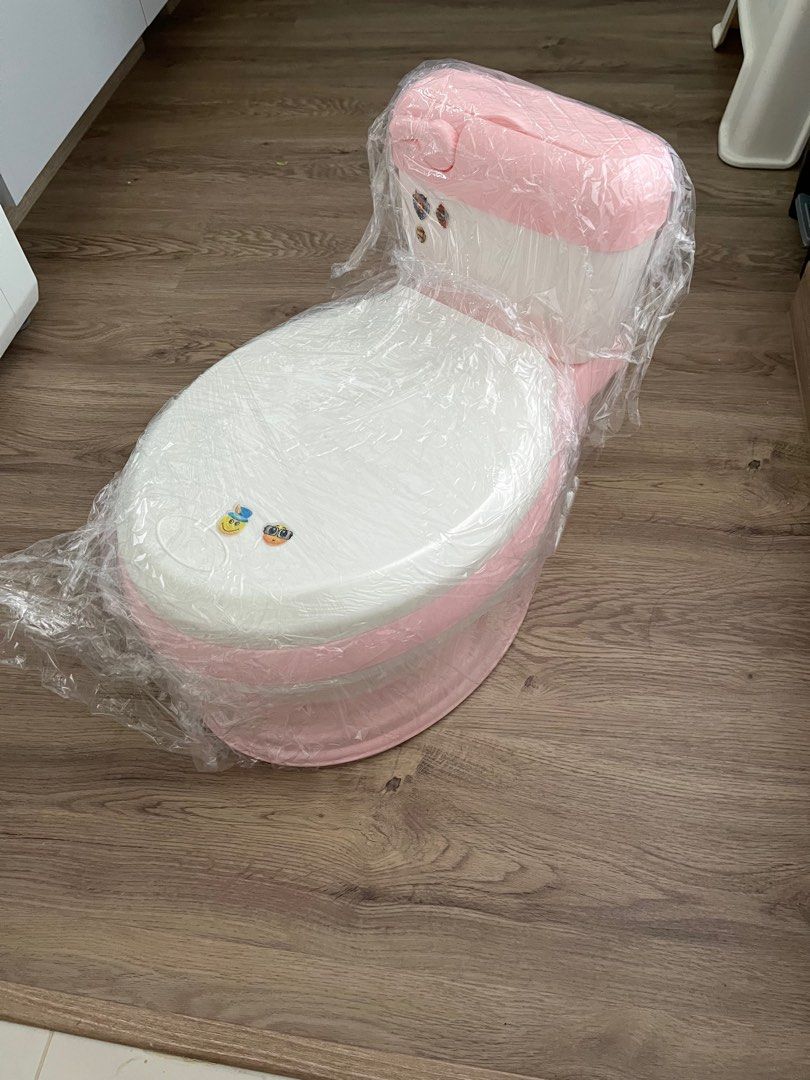 Pink potty, Babies & Kids, Bathing & Changing, Toilet Training on Carousell