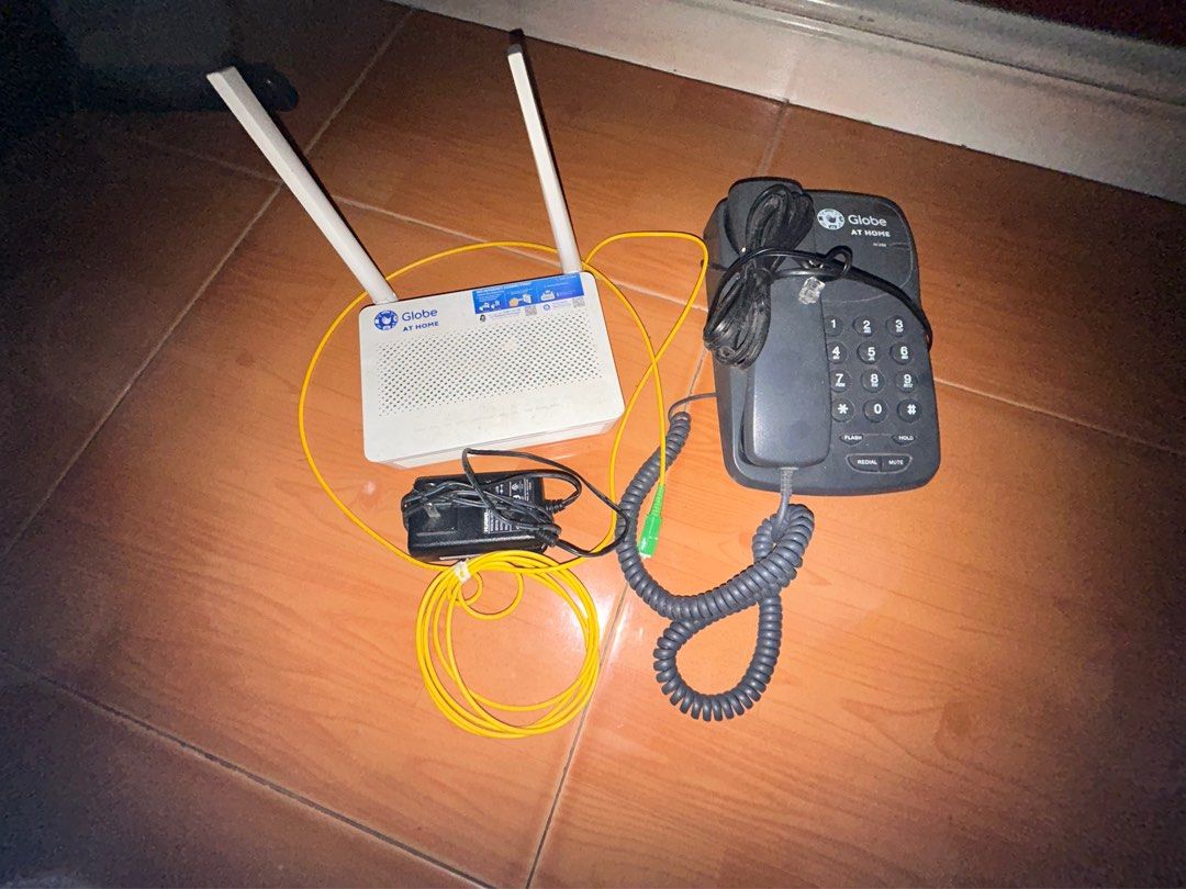 Globe at Home landline and router from Globe Postpaid Plan on Carousell