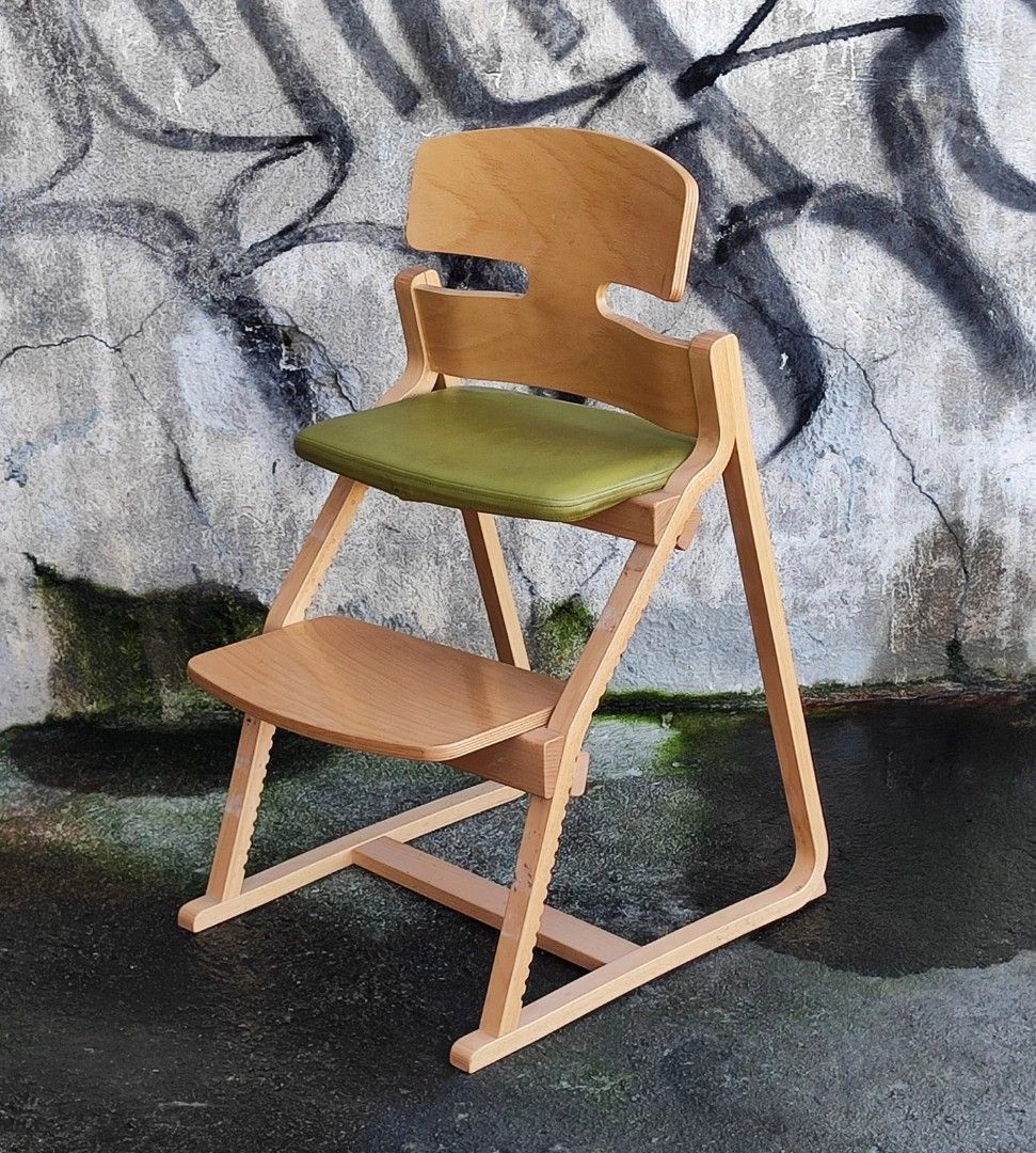The upright adjustable-height children's chair Made from bent beech ...