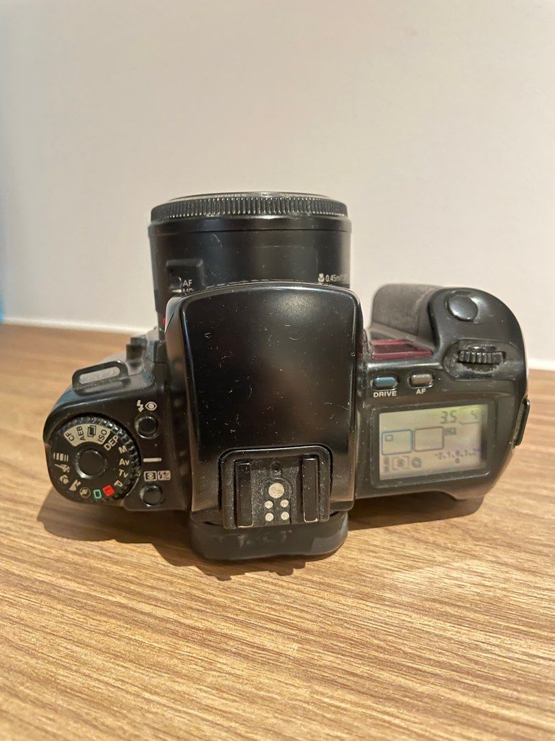 Canon EOS 100QD + 50mm f1.8 mark i, Photography, Cameras on Carousell