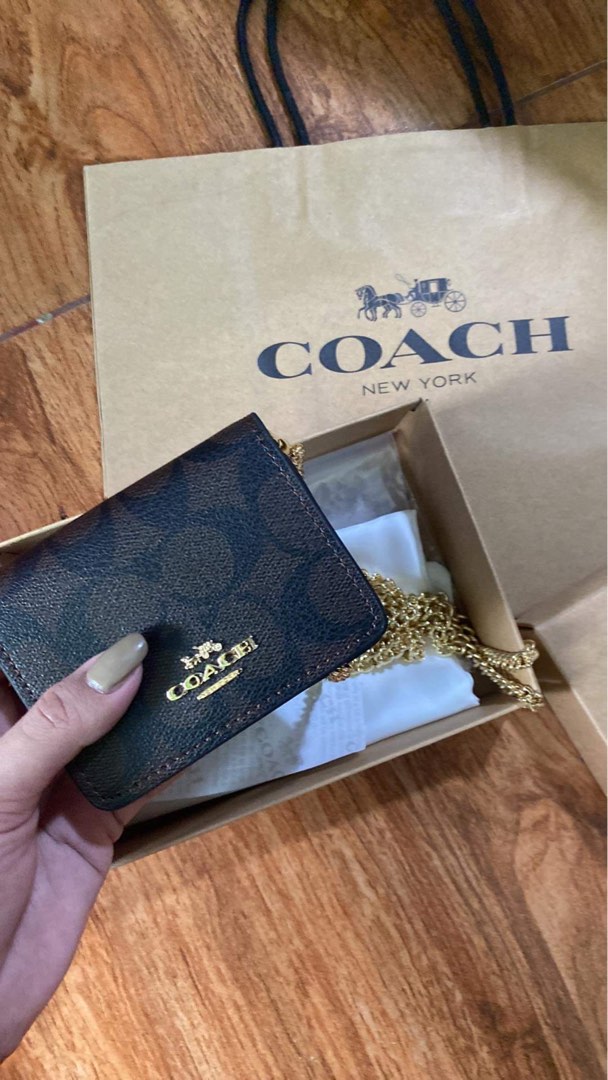 Coach mini sling wallet on Carousell