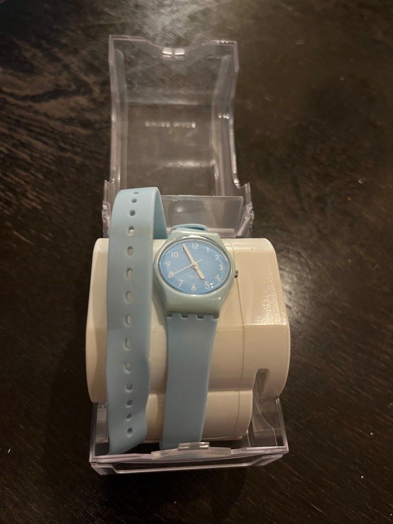 Swatch long strap watch on Carousell