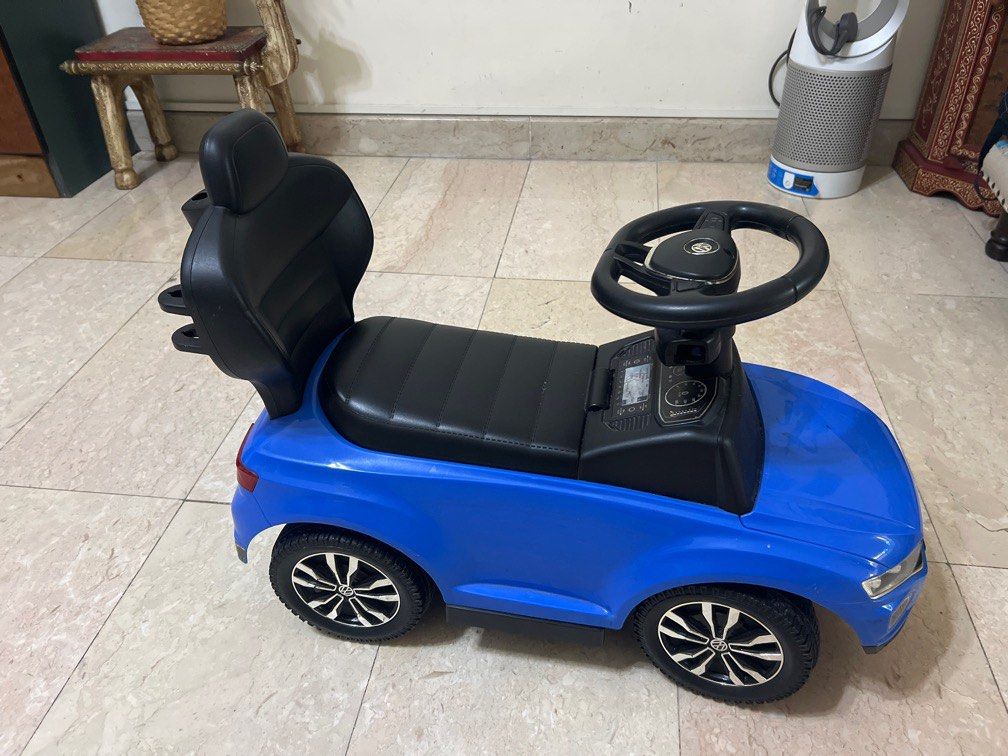 Blue wheel ride on car, Babies & Kids, Infant Playtime on Carousell