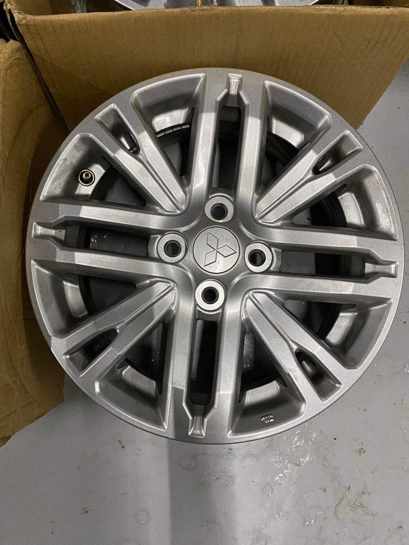 Mirage g4 stock mags, Car Parts & Accessories, Mags and Tires on Carousell