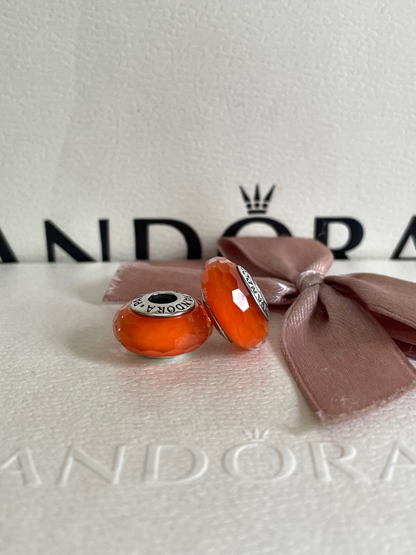 Pandora orange murano on Carousell
