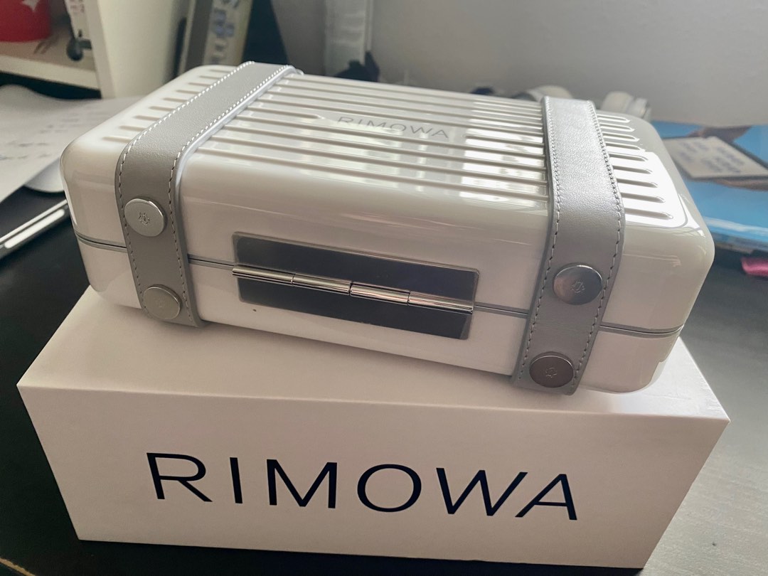 Rimowa clutch white, Luxury, Bags & Wallets on Carousell