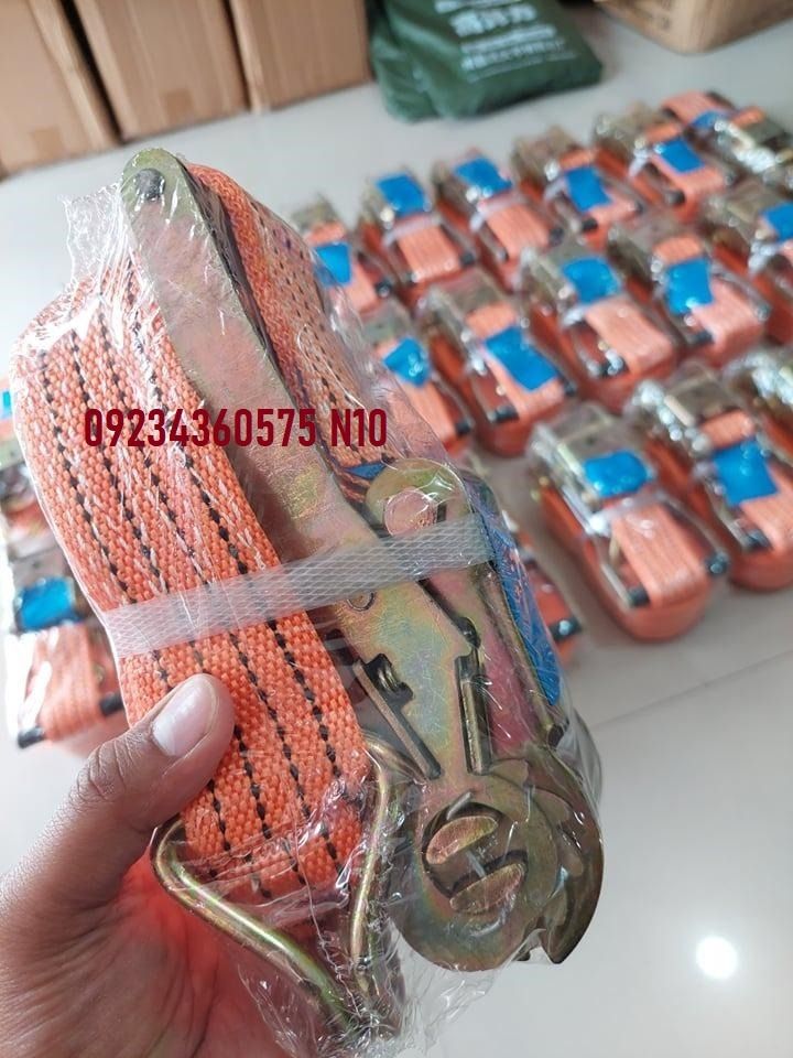 Orange color Ratchet tie down strap on Carousell