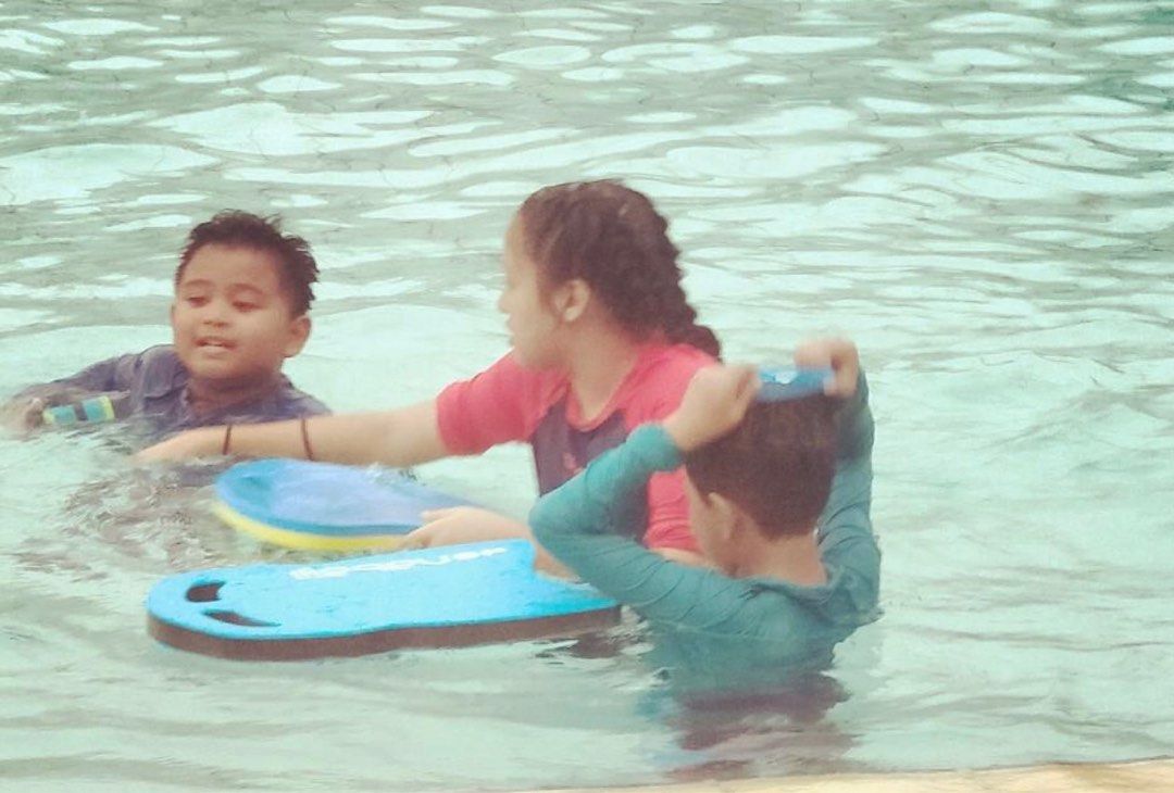 Swimming lessons by female swim teacher, island wide, few footsteps ...