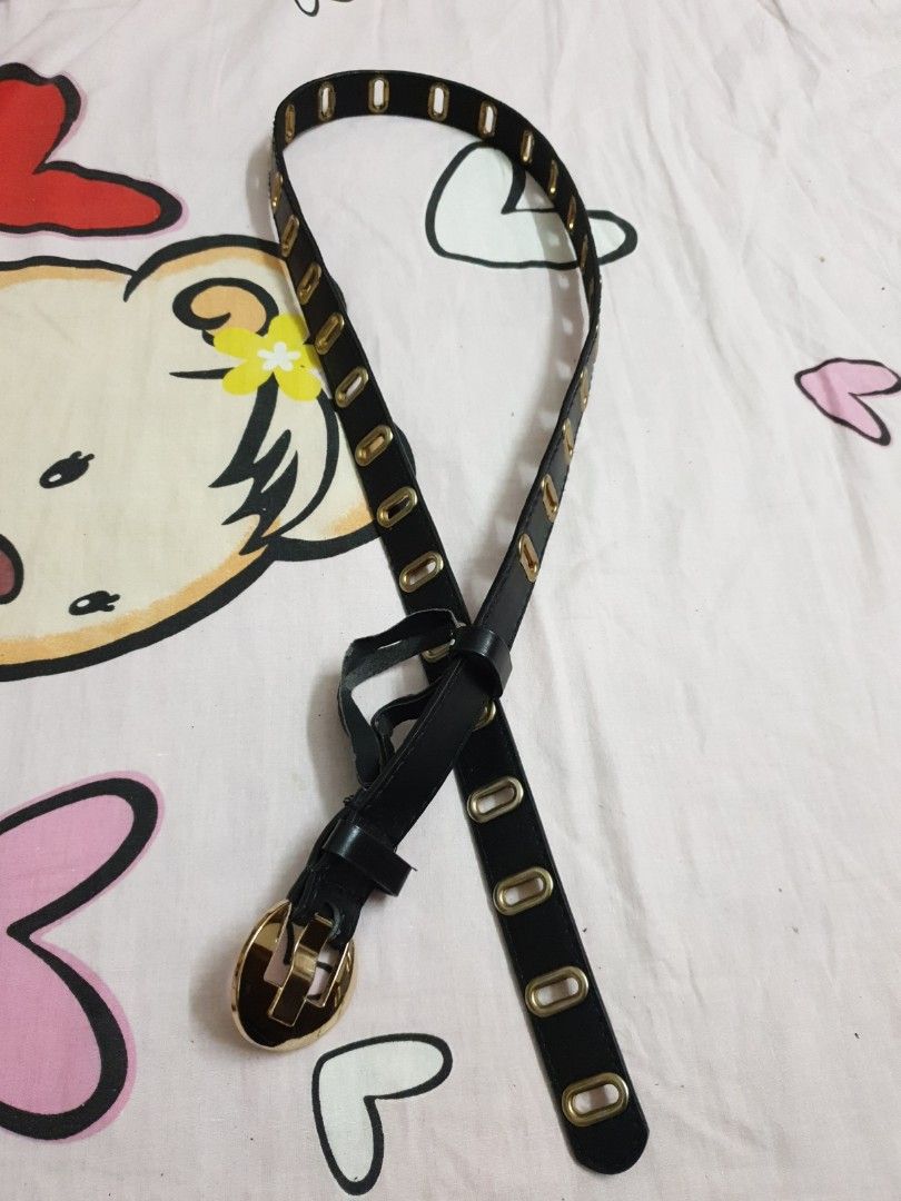 Black belt with gold oval metal cutouts and gold belt hoop, Women's ...
