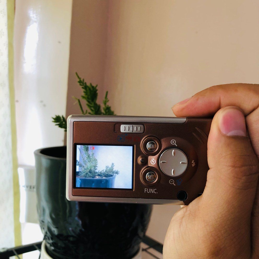 Canon Digital IXUS i Choco Brown color compact mini camera on Carousell