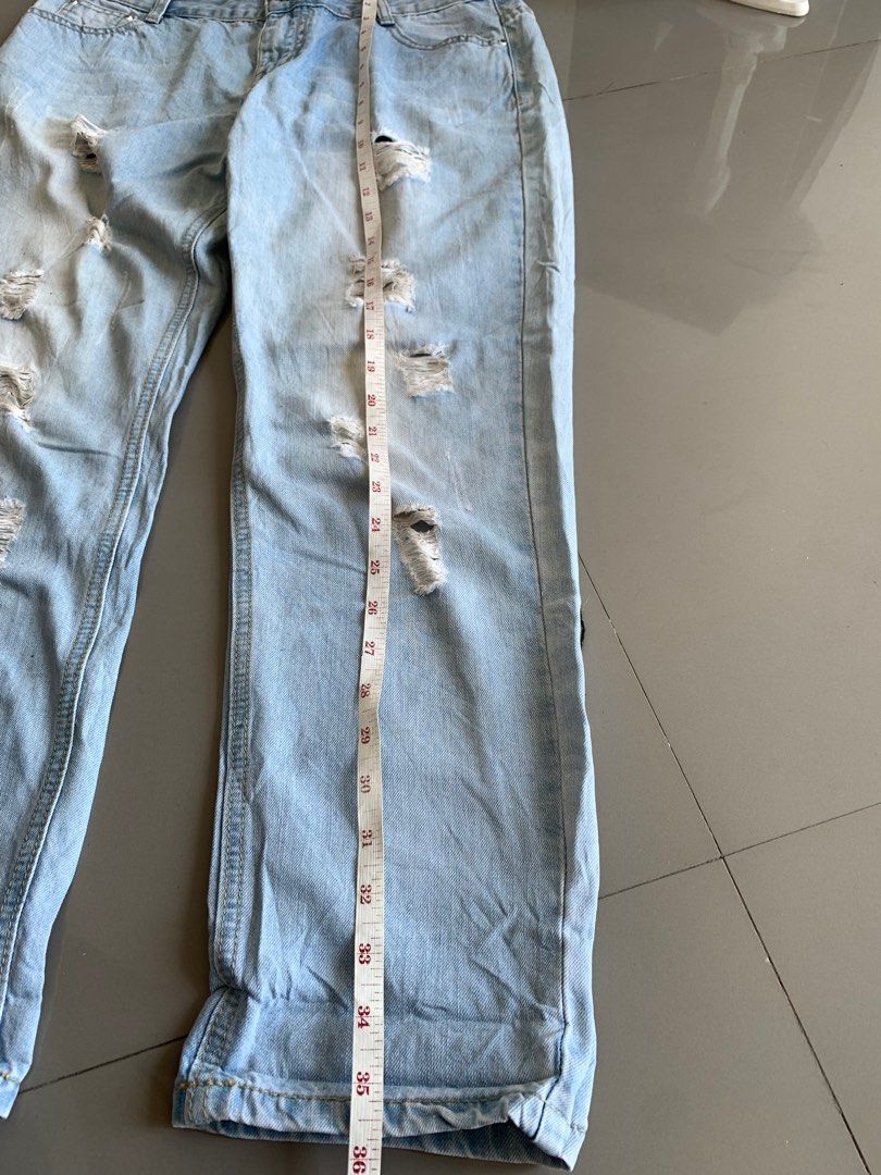 tattered ripped baggy pants denim jeans on Carousell