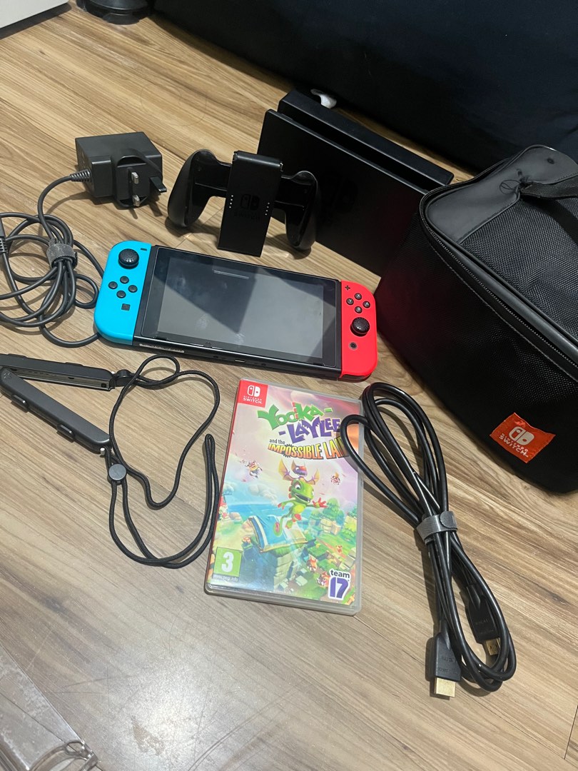 Nintendo Switch Version 2 (original) with complete accessories and with ...