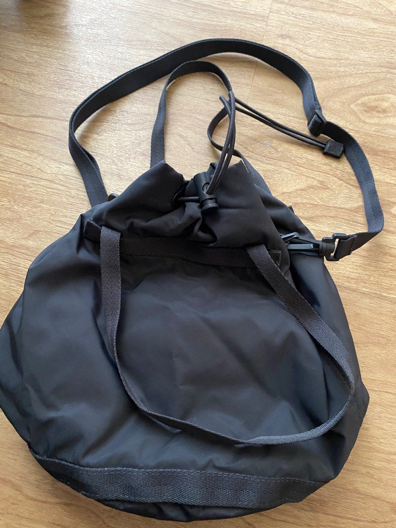Uniqlo bucket bag, Women's Fashion, Bags & Wallets, Cross-body Bags on ...