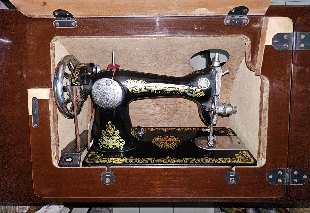 Vintage Flying Man Sewing Machine, Hobbies & Toys, Memorabilia ...