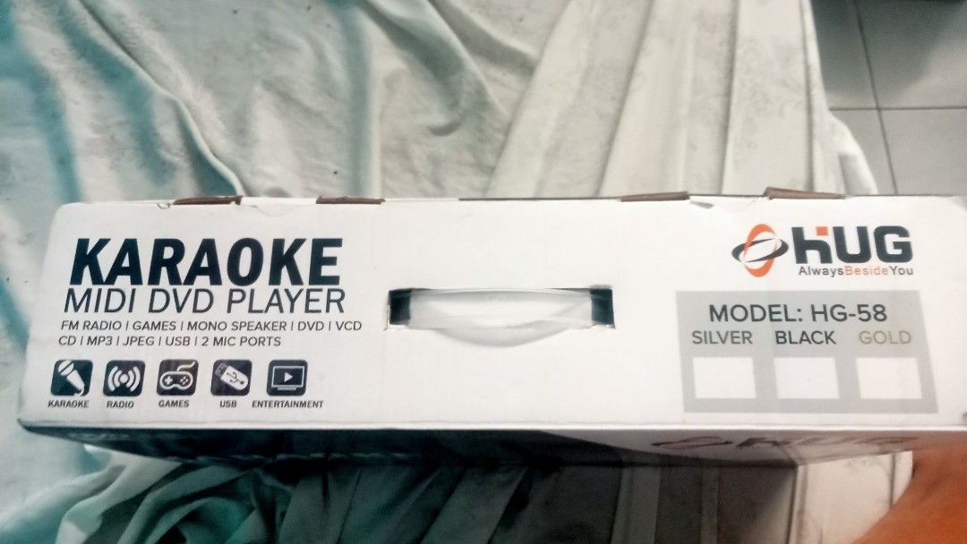 Hug midi DVD player with karaoke and games on Carousell