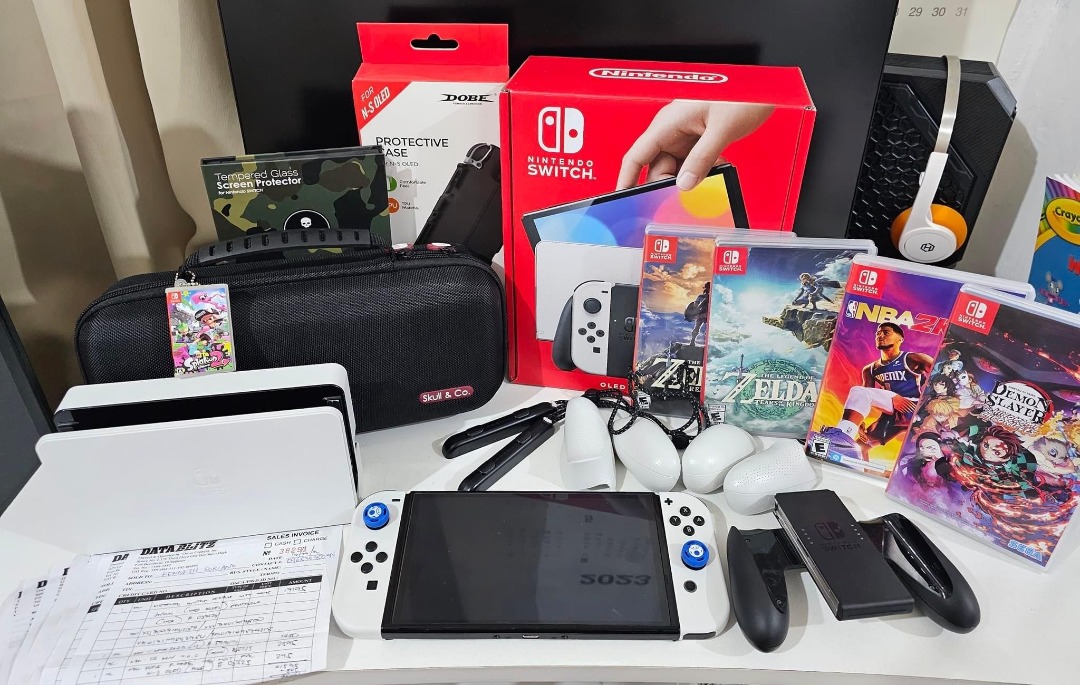 Nintendo Switch Oled + Games on Carousell