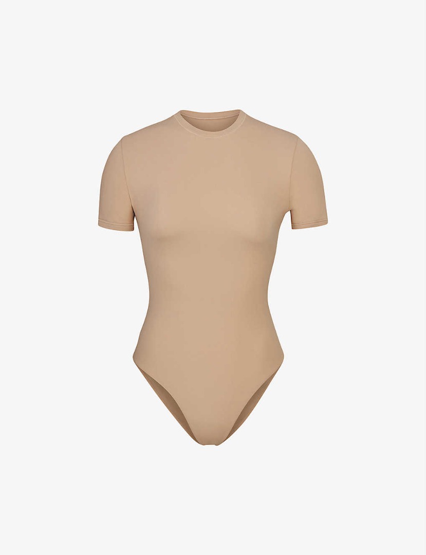 SKIMS Fits Everybody high-neck stretch-woven body on Carousell SKIMS Fits Everybody high-neck stretch-woven body on Carousell