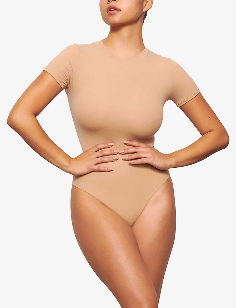 SKIMS Fits Everybody high-neck stretch-woven body on Carousell SKIMS Fits Everybody high-neck stretch-woven body on Carousell