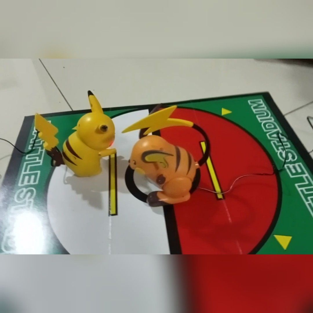 Tomy remote control battle stadium set Pikachu vs raichu, Hobbies ...
