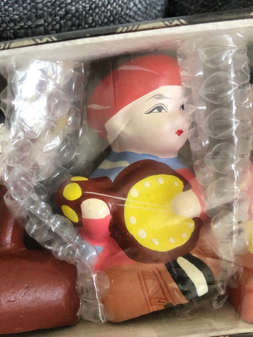 Clay figurines of children playing musical instruments (China), Hobbies ...