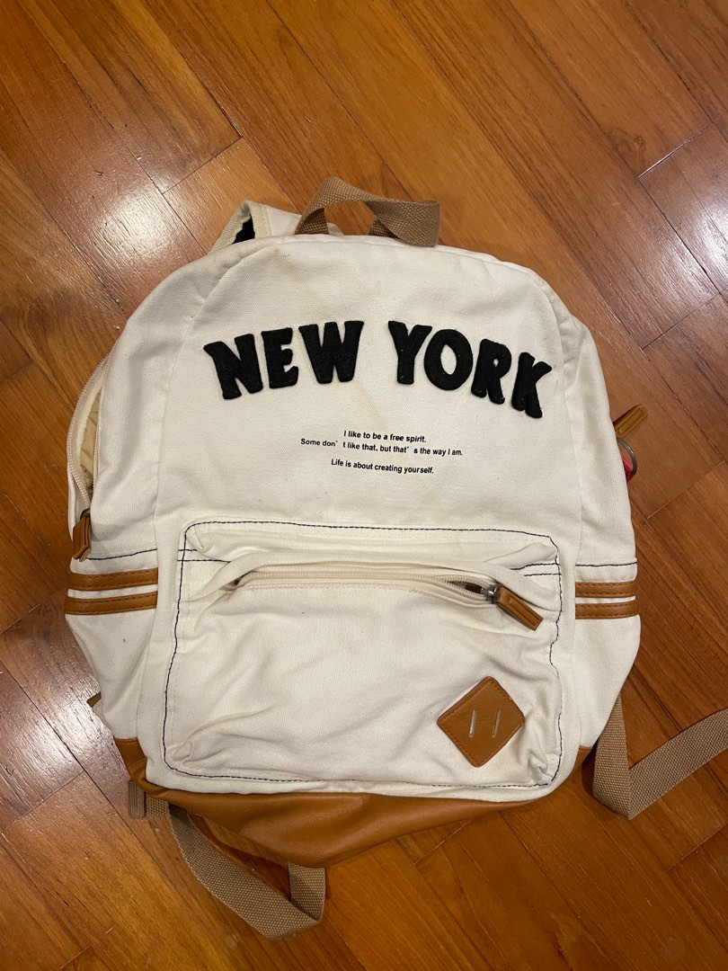 cream coloured Backpack (New York), Women's Fashion, Bags & Wallets ...