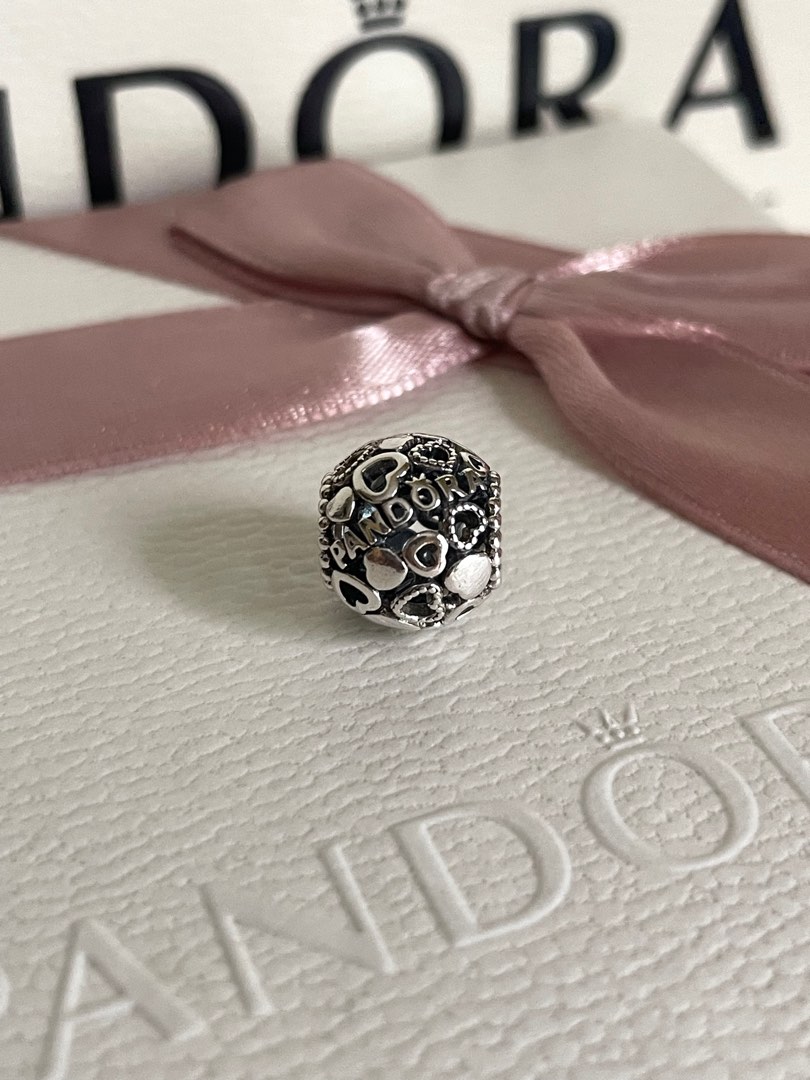 Pandora Openwork logo on Carousell