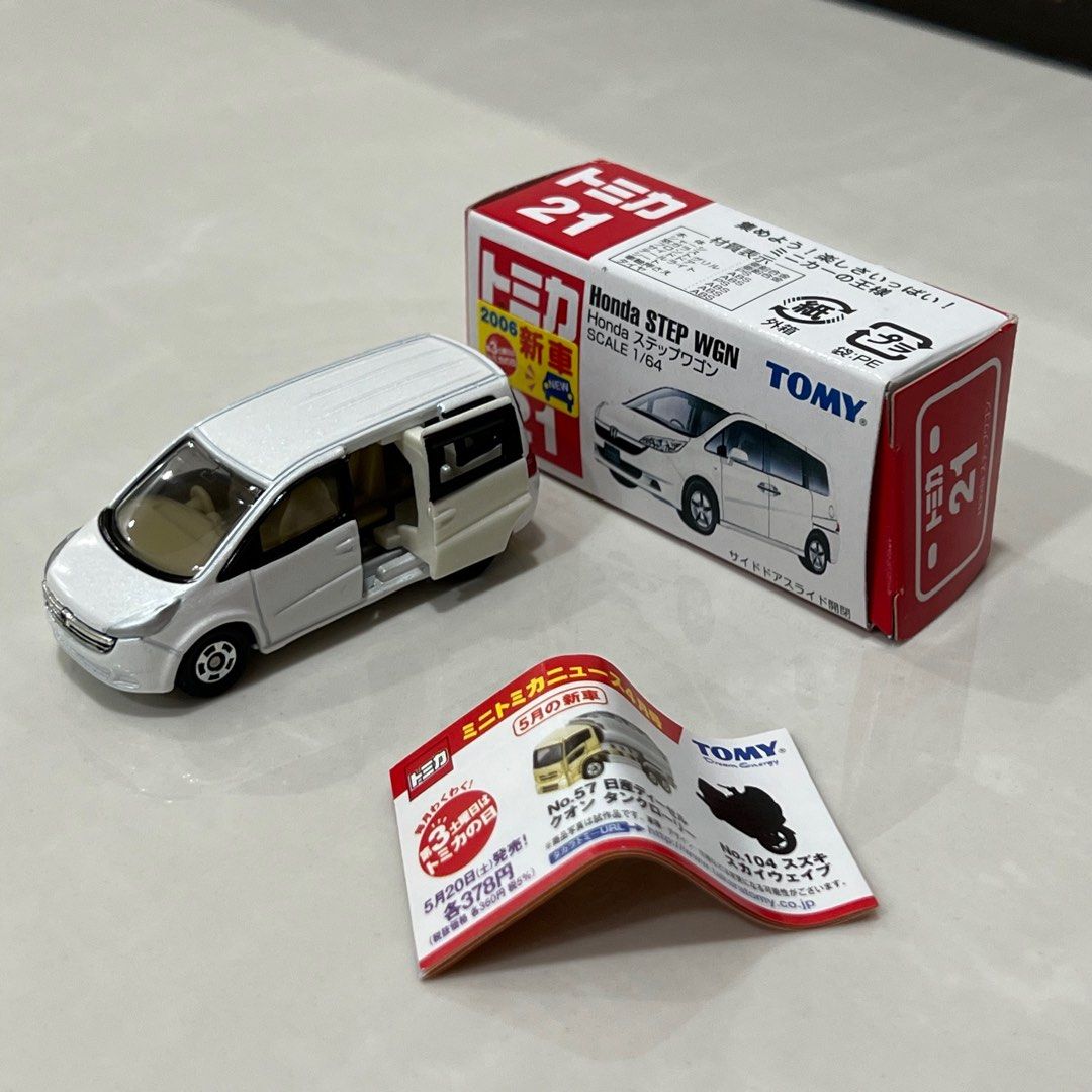 Tomica #21 Honda Step Wgn, #33 Toyota Vitz with new car sticker ...