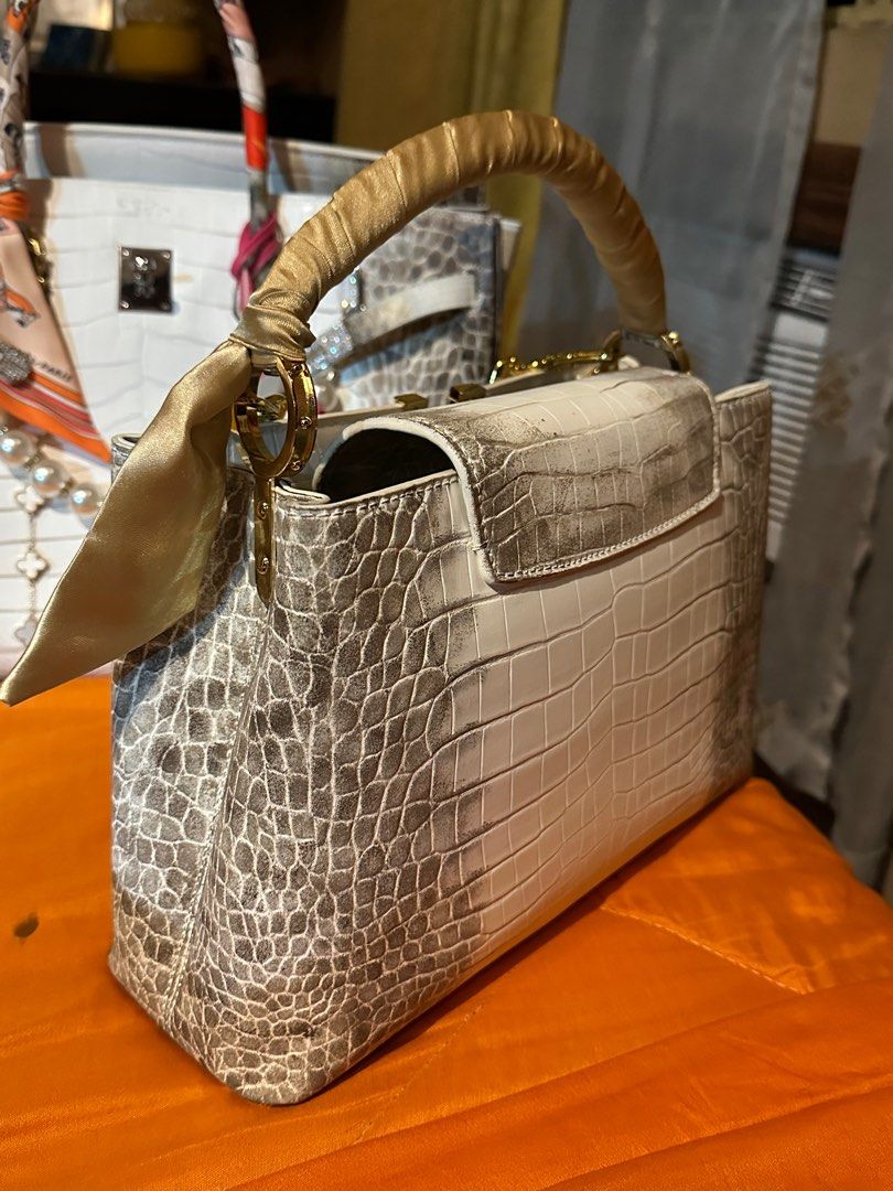 LV CAPUCINE in himalayan crocodile on Carousell