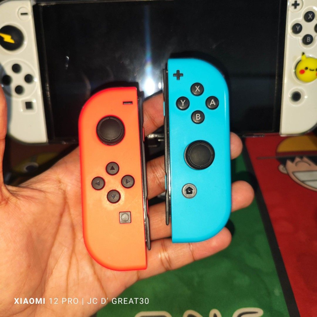 Nintendo Switch joycon Neon blue and red Original, Video Gaming, Gaming ...