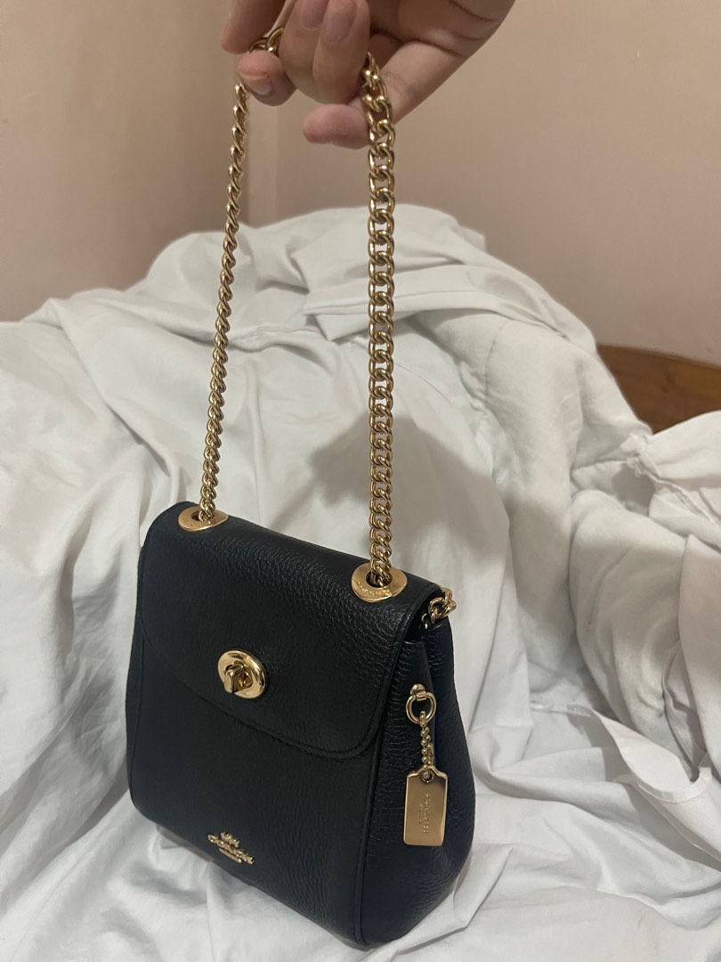 Coach mini 2 way backpack on Carousell