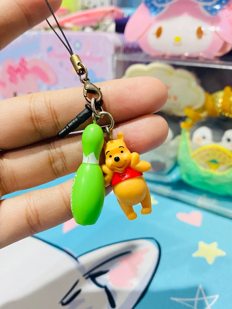 pooh keychain with earphone jack cover on Carousell