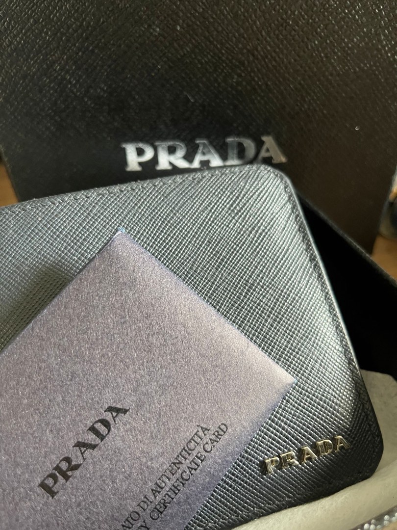 Prada male wallet, Luxury, Bags & Wallets on Carousell