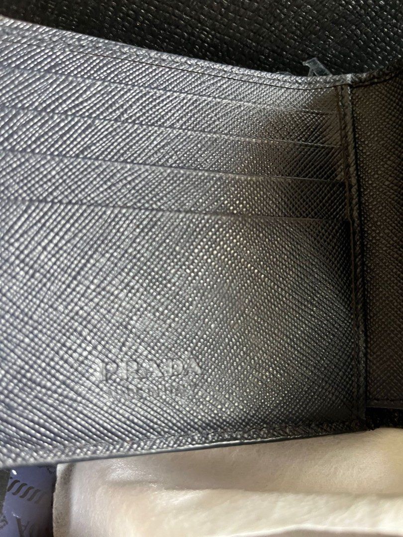 Prada male wallet, Luxury, Bags & Wallets on Carousell