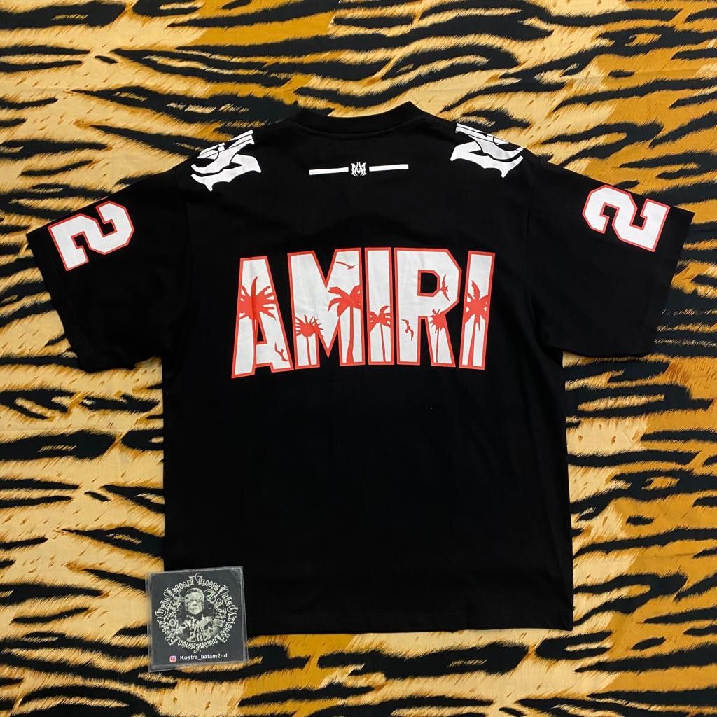 Amiri tee, Fesyen Pria, Pakaian , Atasan di Carousell