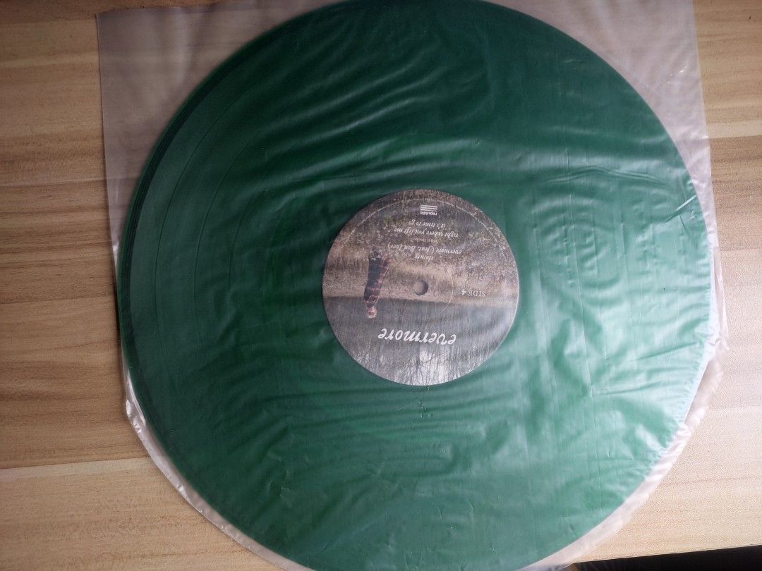 Taylor Swift - evermore (Translucent Green) Vinyl Record LP on Carousell