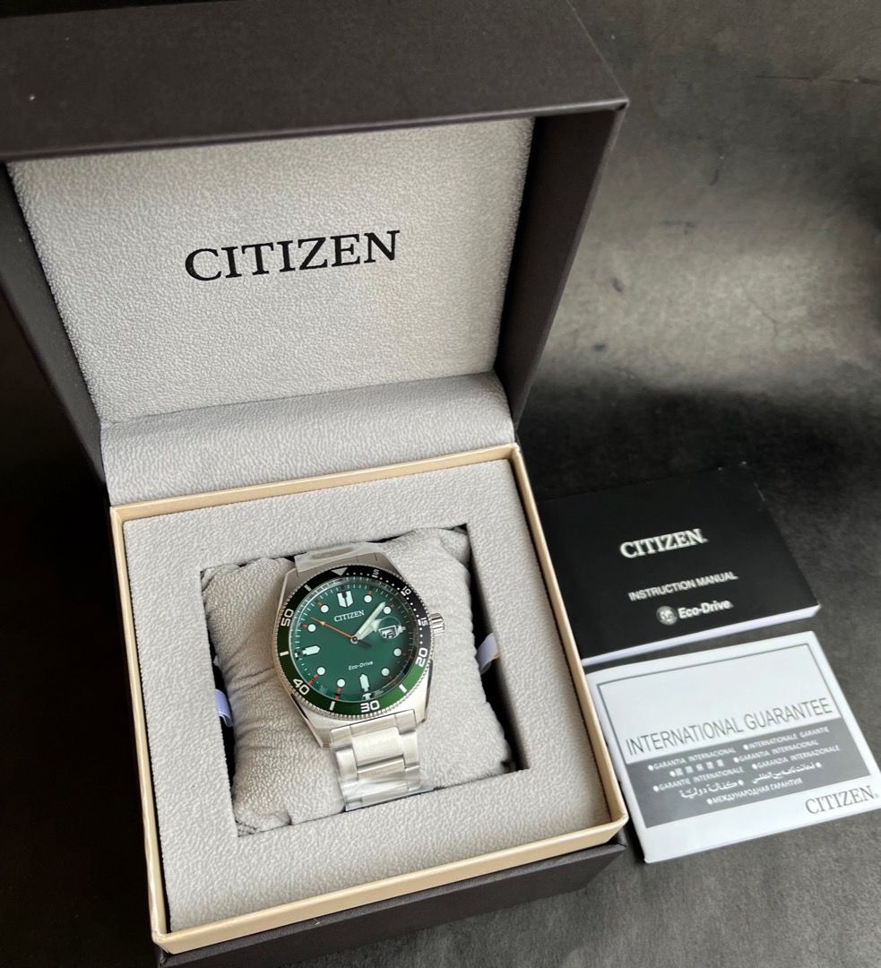 BNEW AUTHENTIC! Citizen Watch Eco-Drive AW1768-80X Green Date Dial ...