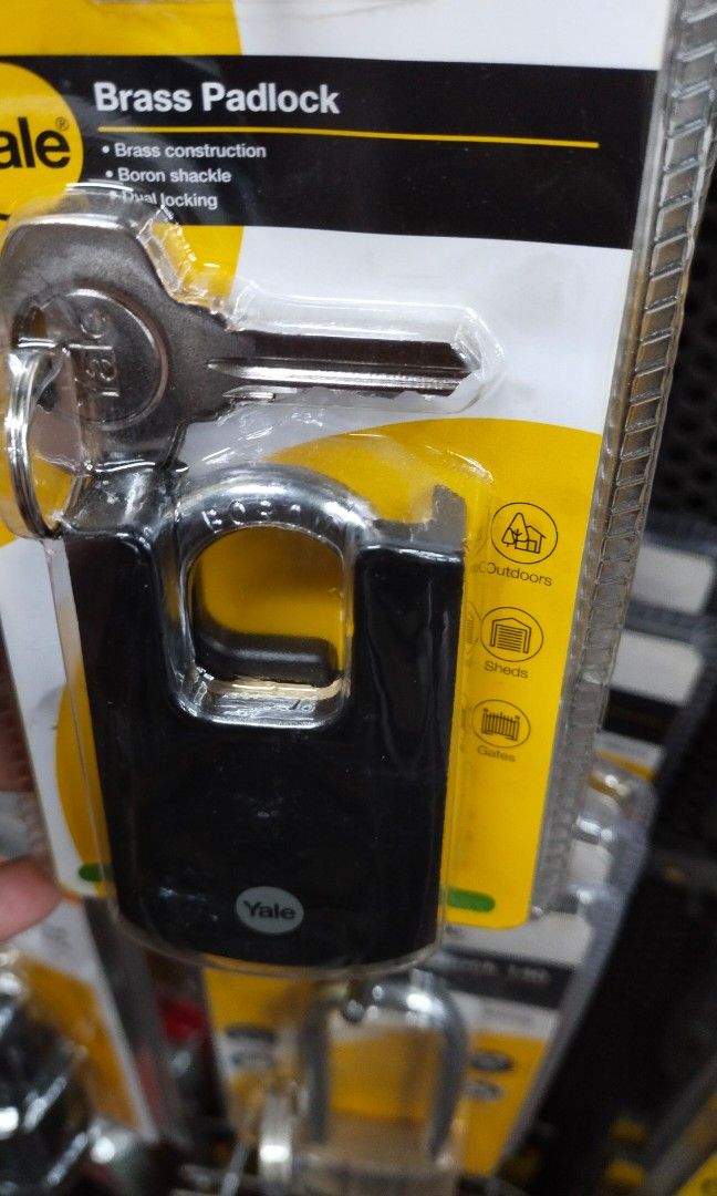 Yale solid brass body padlock with shackle protector shrouded with ...