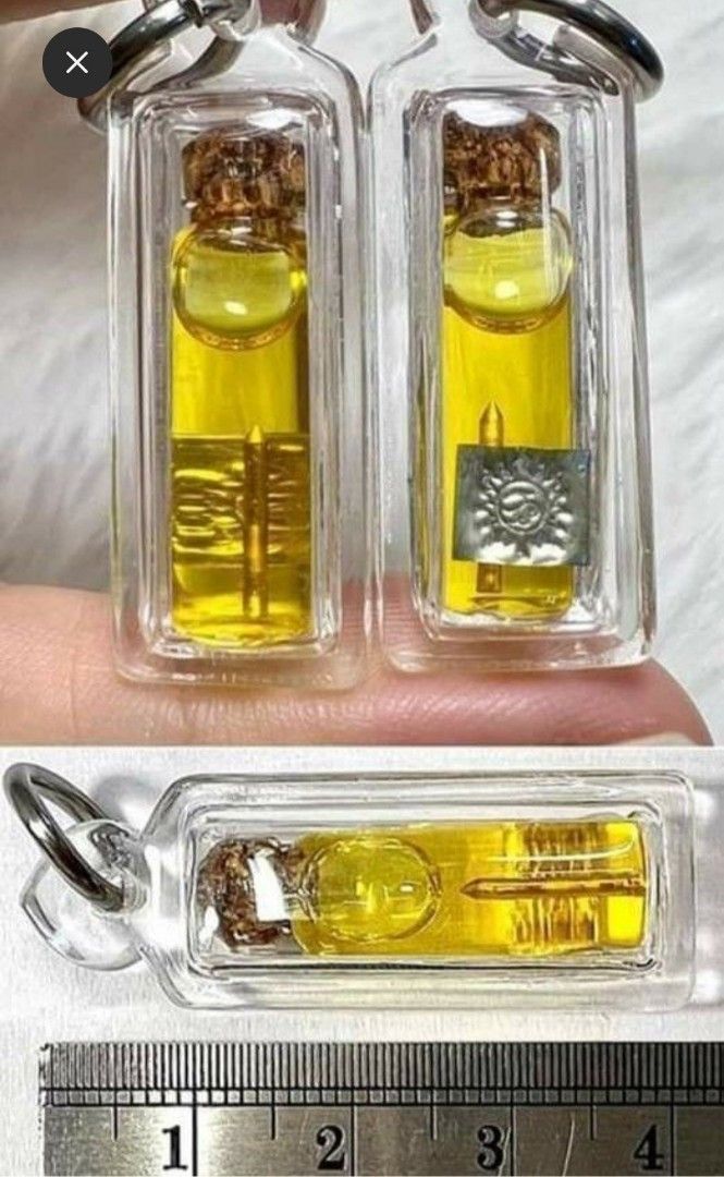 Golden naga strength ka mong nee oil with golden needle by Phra Arjarn ...