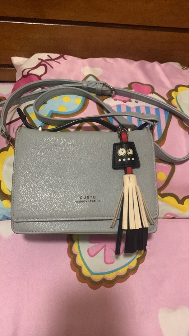 Dusto sling bag, Women's Fashion, Bags & Wallets, Cross-body Bags on ...