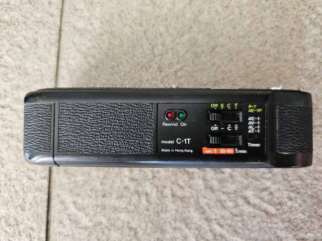 Canon A-1 camera, power winder, Photography, Cameras on Carousell