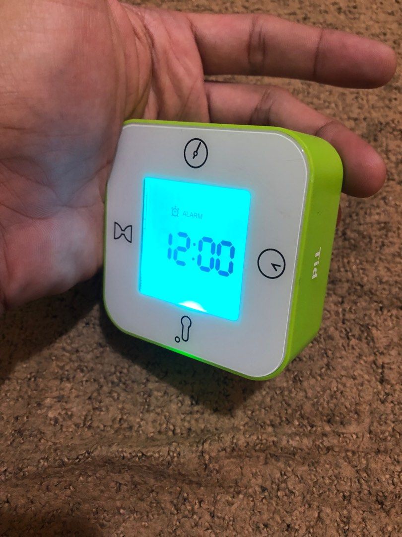 Multi function rotating desk clock-alarm-temp-stopwatch on Carousell