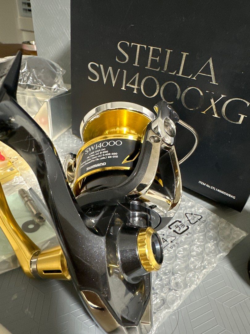 Stella SW14000XG + SW 14k spare spool, Sports Equipment, Fishing on Carousell
