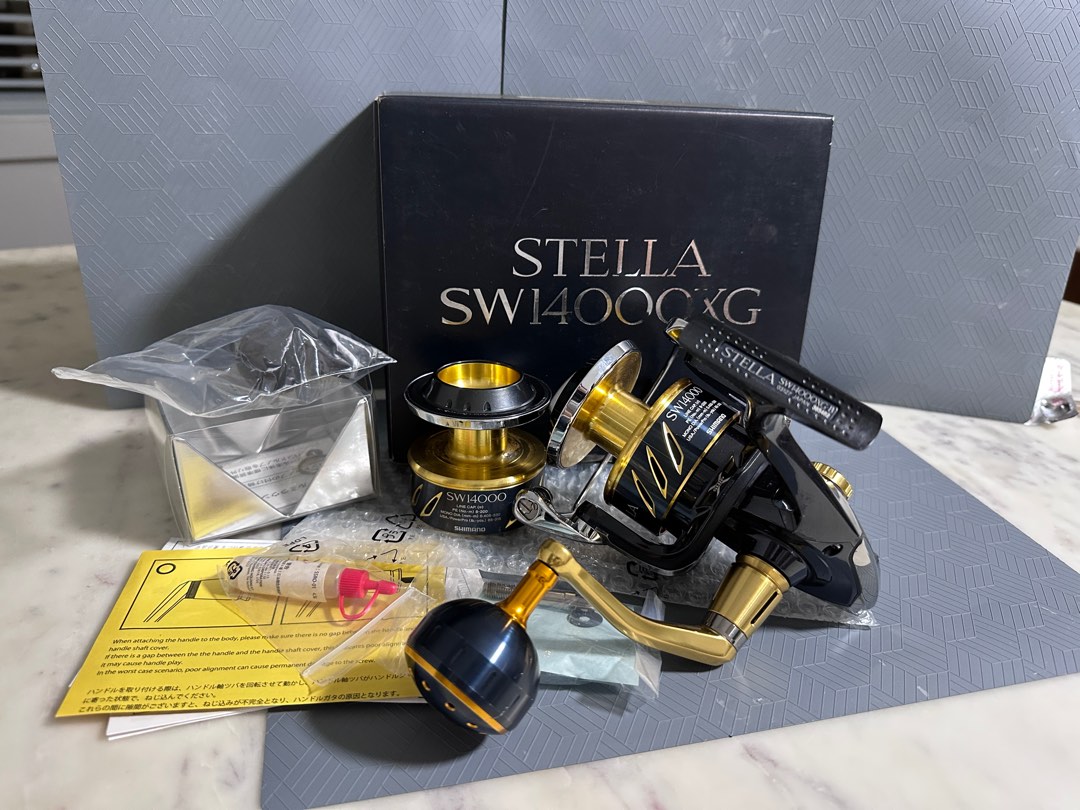 Stella SW14000XG + SW 14k spare spool, Sports Equipment, Fishing on Carousell