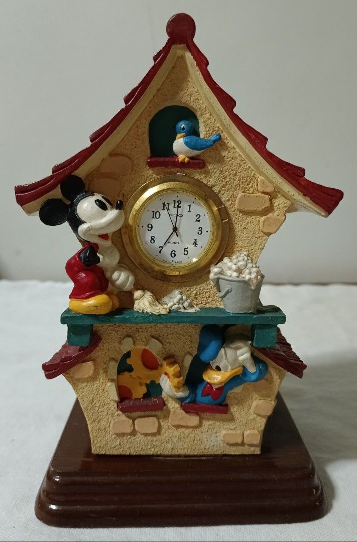 Walt Disney clock. Bought in Disneyland. About 7in tall. on Carousell