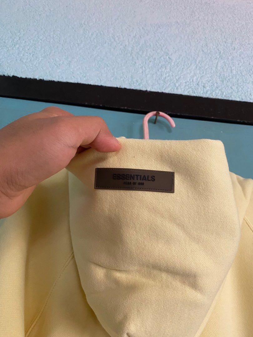 Fear of God Essentials Canary Hoodie on Carousell
