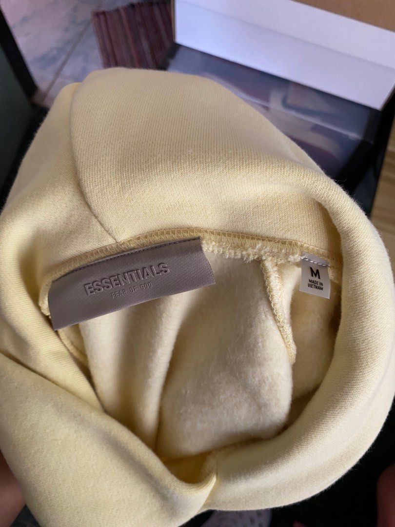 Fear of God Essentials Canary Hoodie on Carousell