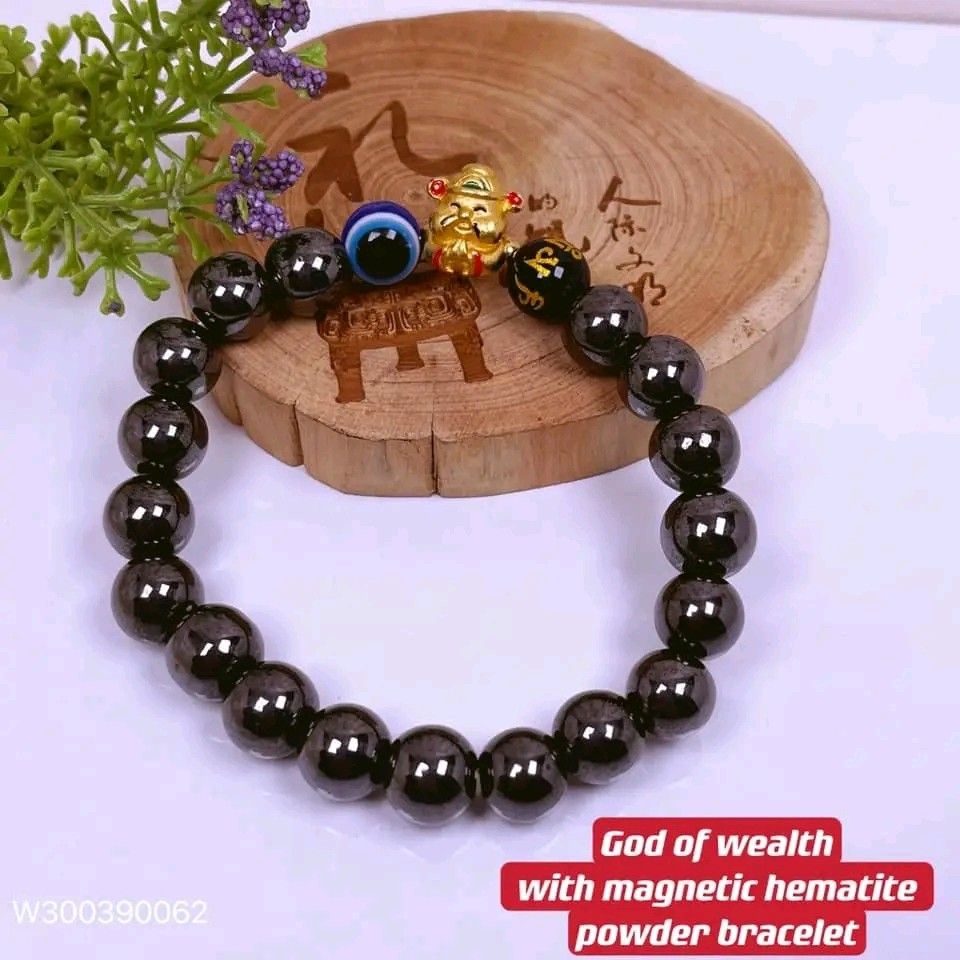 God of wealth with magnetic hematite powder bracelet on Carousell