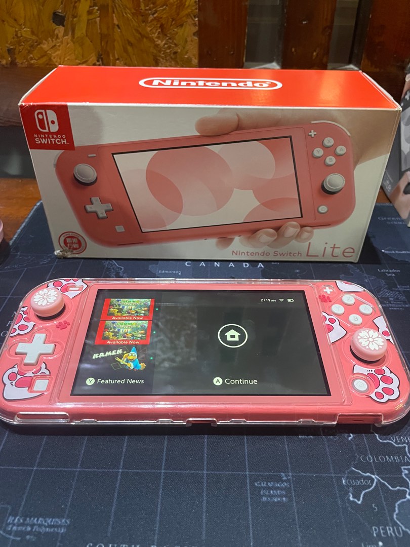 Nintendo Switch Lite coral pink, Video Gaming, Video Game Consoles ...
